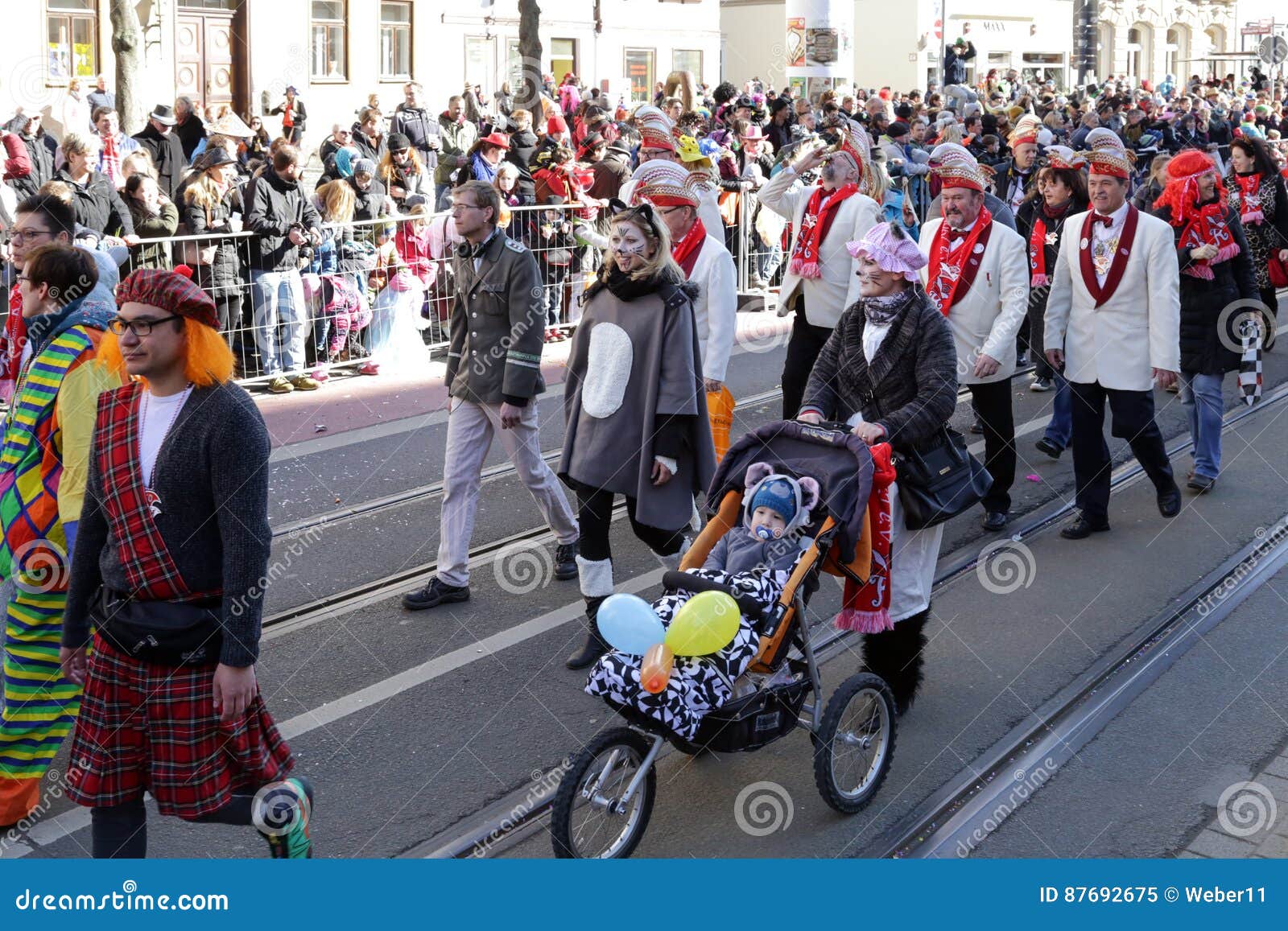 Baby in a Stroller on a Carnival Editorial Image - Image of dress ...