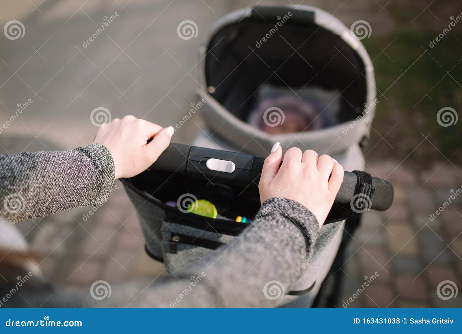 Baby in Stroller. First Person View of Mom Walking with Baby Stock ...