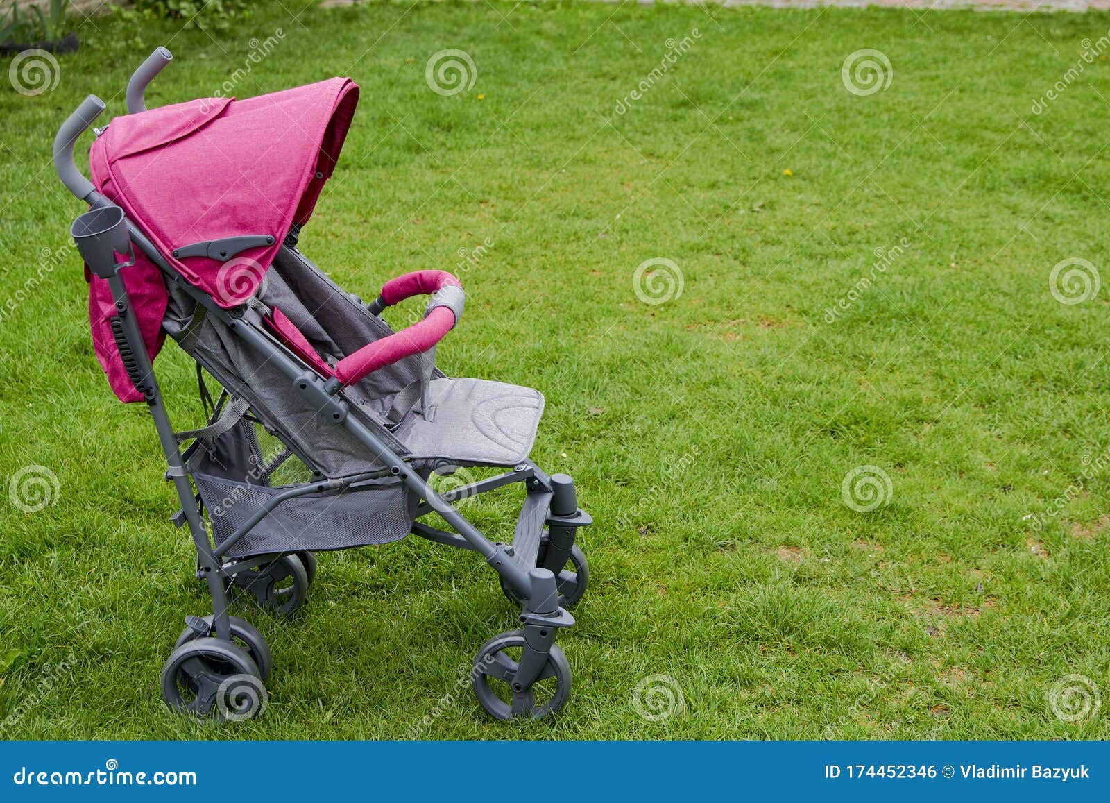 Baby Stroller on the Grass,gray and Pink Color Stroller New on Grass ...