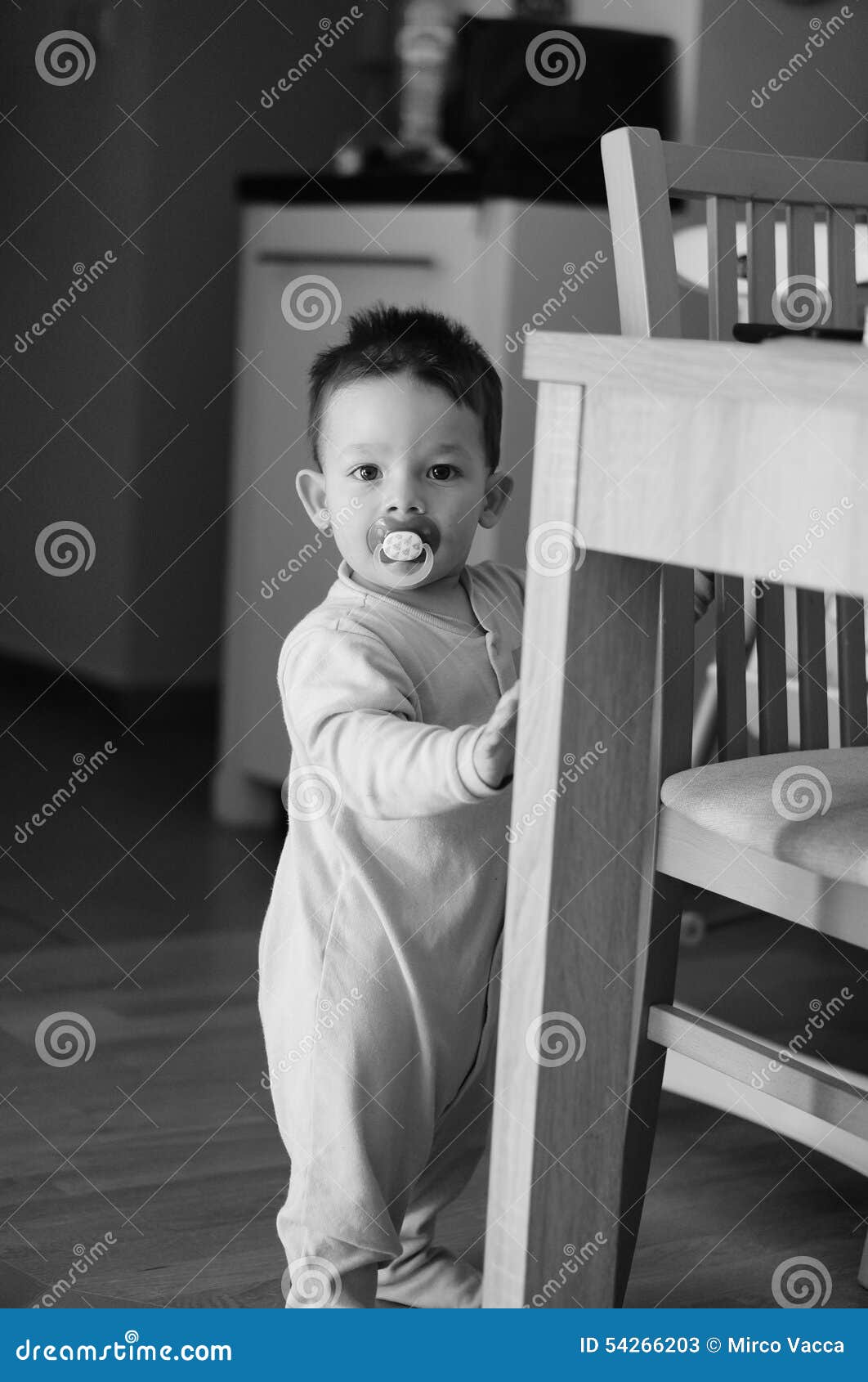 Baby by table stock image. Image of child, black, white - 54266203