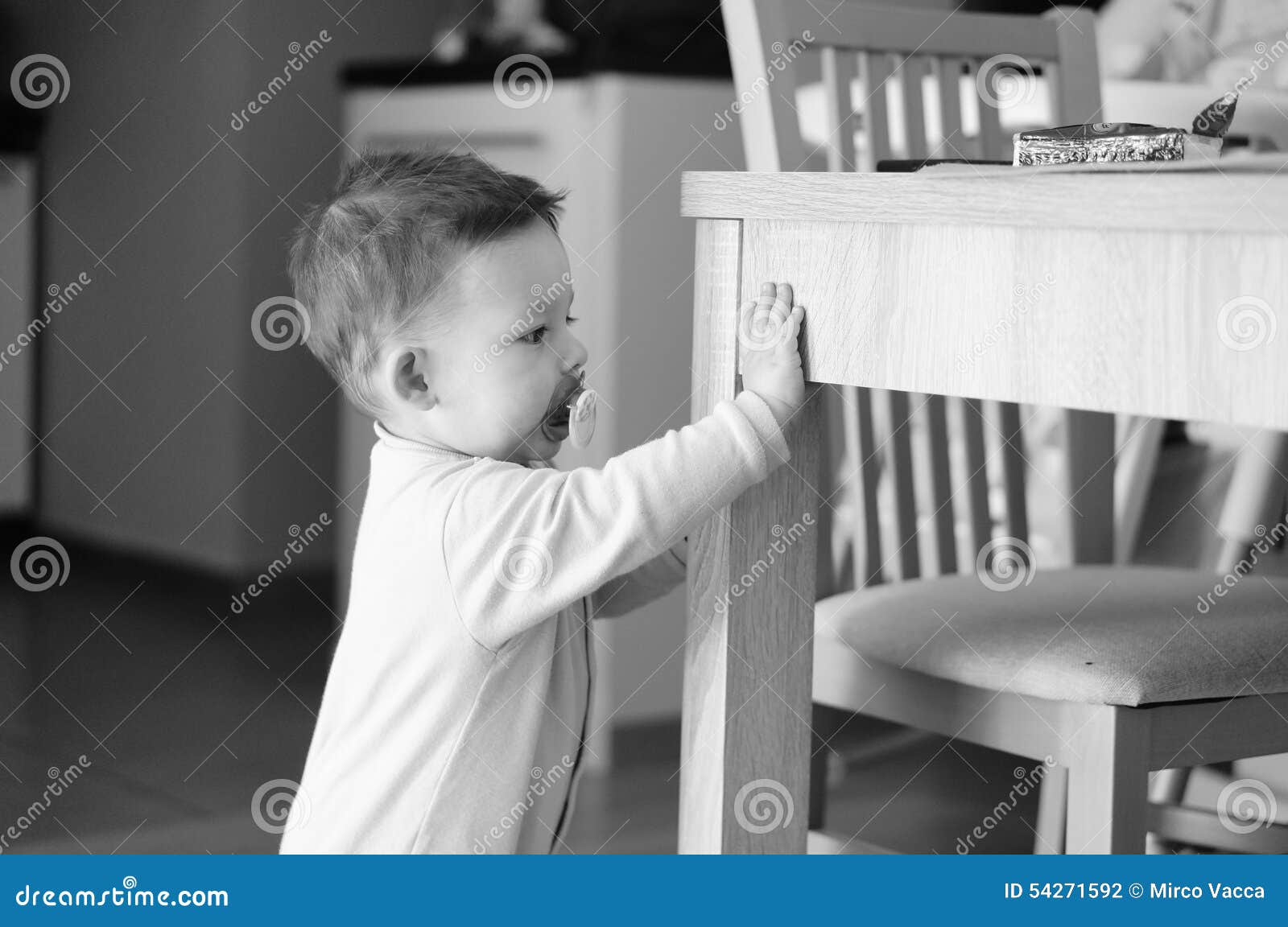 Baby by table stock photo. Image of furniture, house - 54271592
