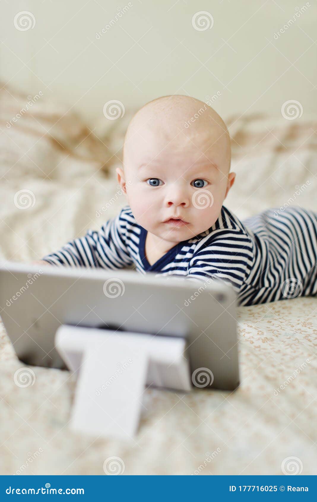 Baby with tablet pc stock image. Image of attention - 177716025