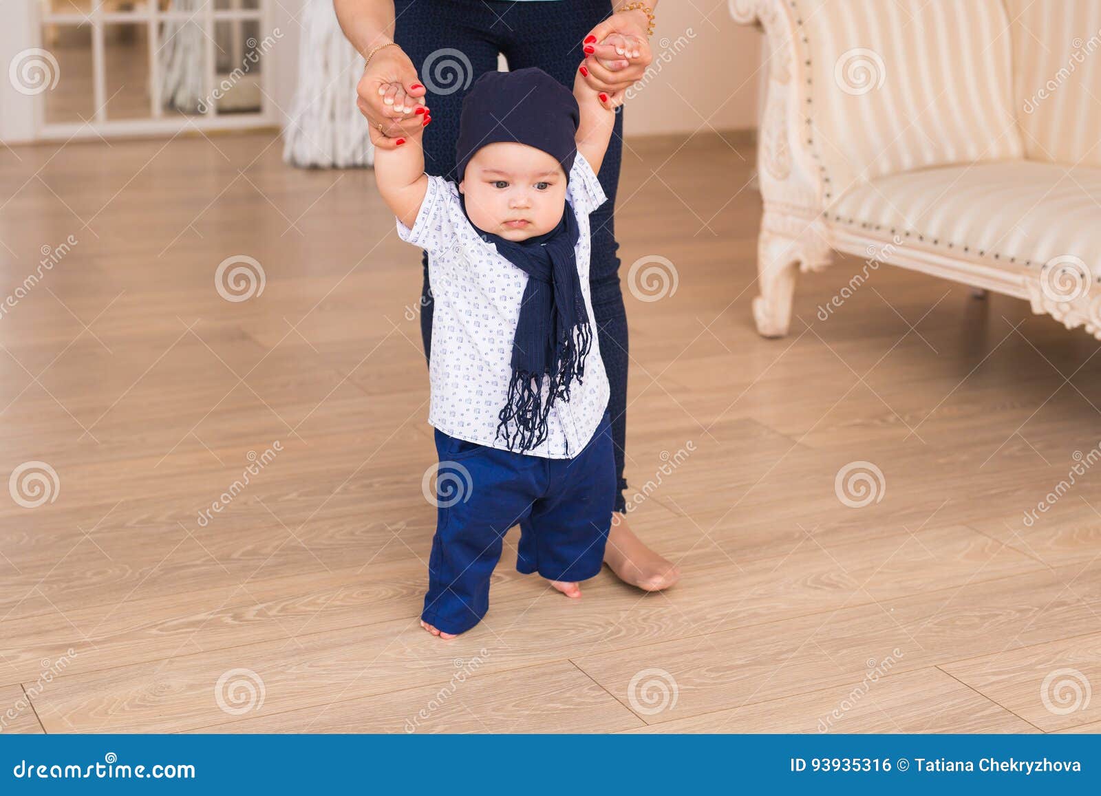 Baby Taking First Steps with Mother Help Stock Photo - Image of joyful ...