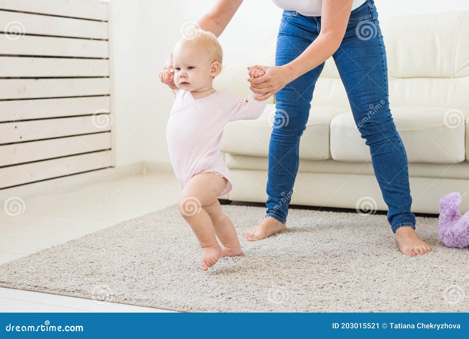 Baby Taking First Steps with Mother`s Help at Home Stock Image - Image ...