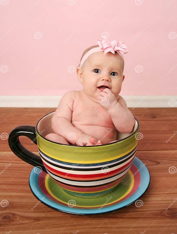 Baby in a tea cup stock image. Image of happy, beauty - 18612539