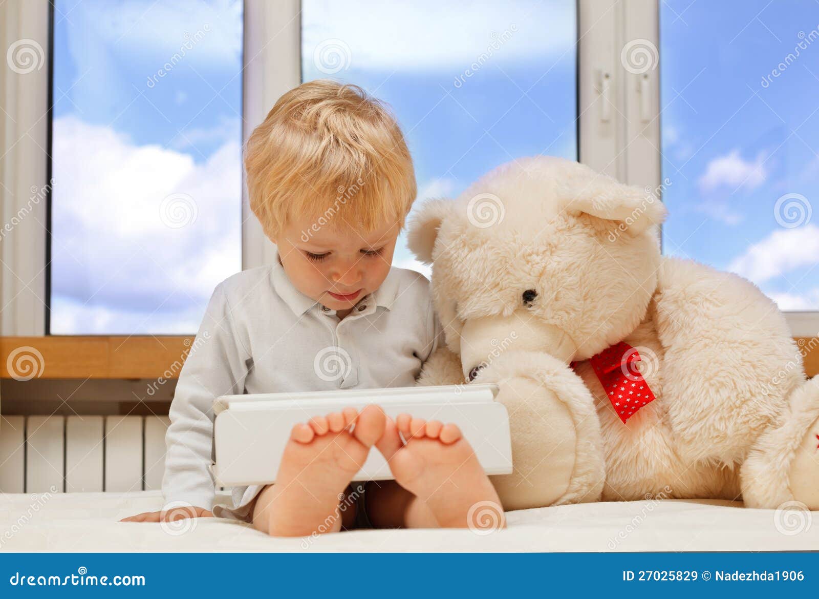 Baby and Teddy with Touch Pad Stock Image - Image of indoors, baby ...