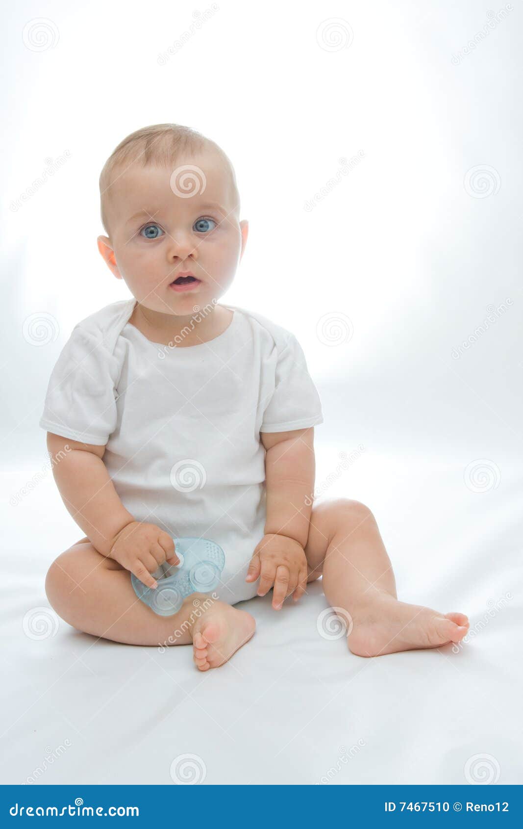 Baby with teether stock photo. Image of innocent, cute - 7467510