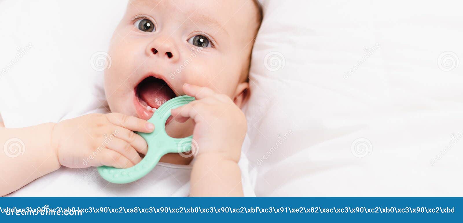 A Baby with a Teether on a White Background . Teething. Children& X27;s ...
