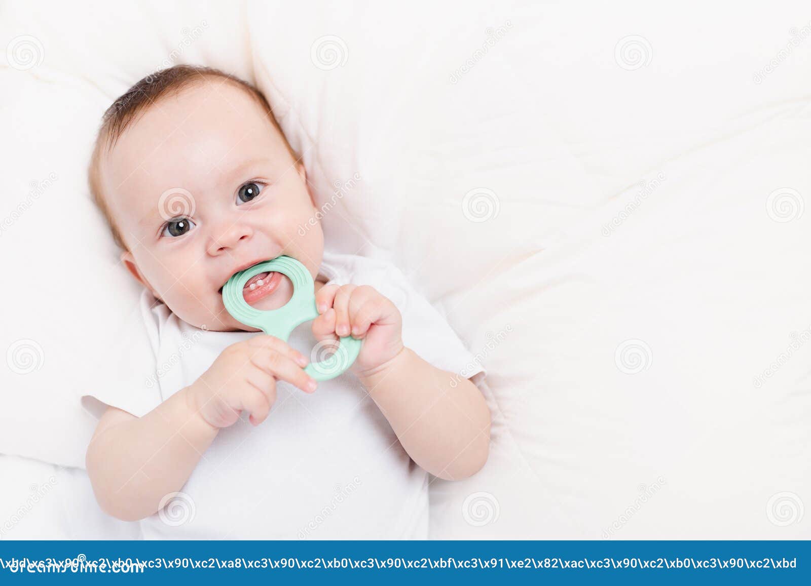 A Baby with a Teether on a White Background . Teething. Children& X27;s ...