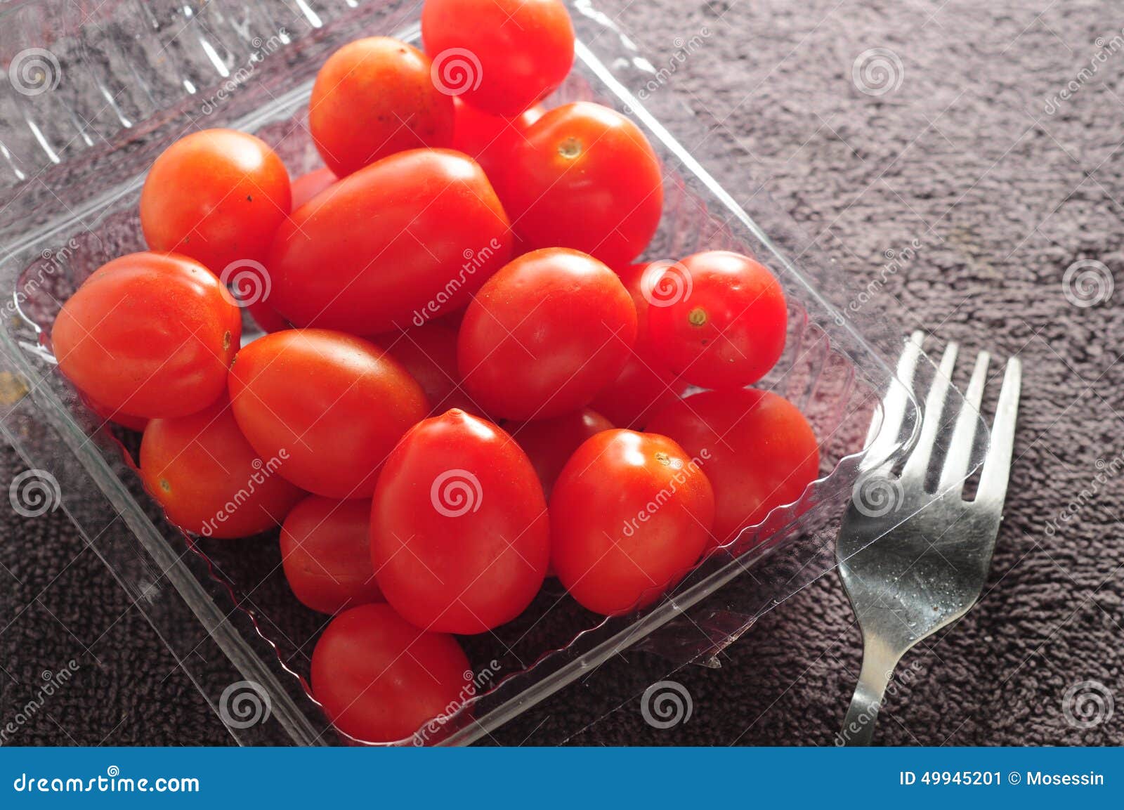 Baby tomato stock image. Image of plastic, mini, fruit - 49945201