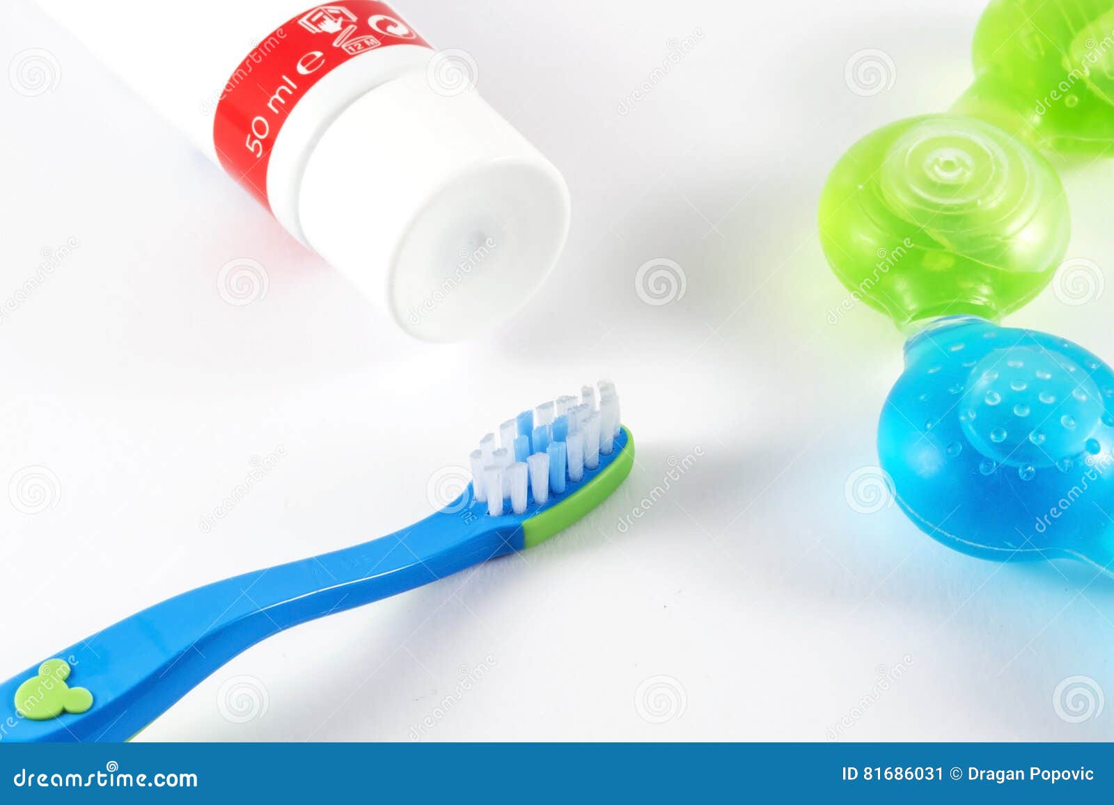 Baby Toothbrush and Toothpaste on White Background Stock Image - Image ...