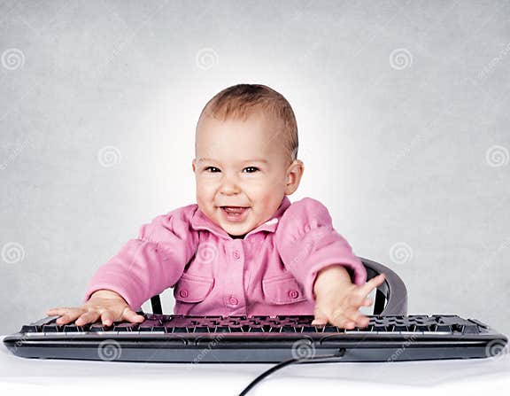 Baby typing stock photo. Image of happiness, game, adorable - 31254968
