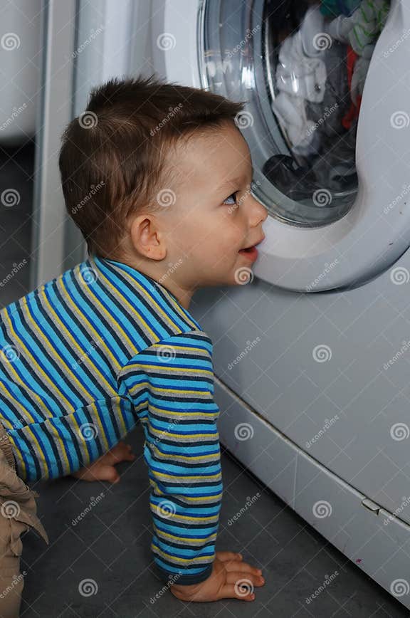 Baby washing machine stock image. Image of looking, washing - 54360701