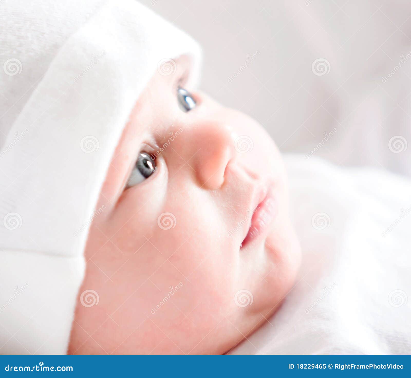 Baby in white stock image. Image of closeup, expression - 18229465