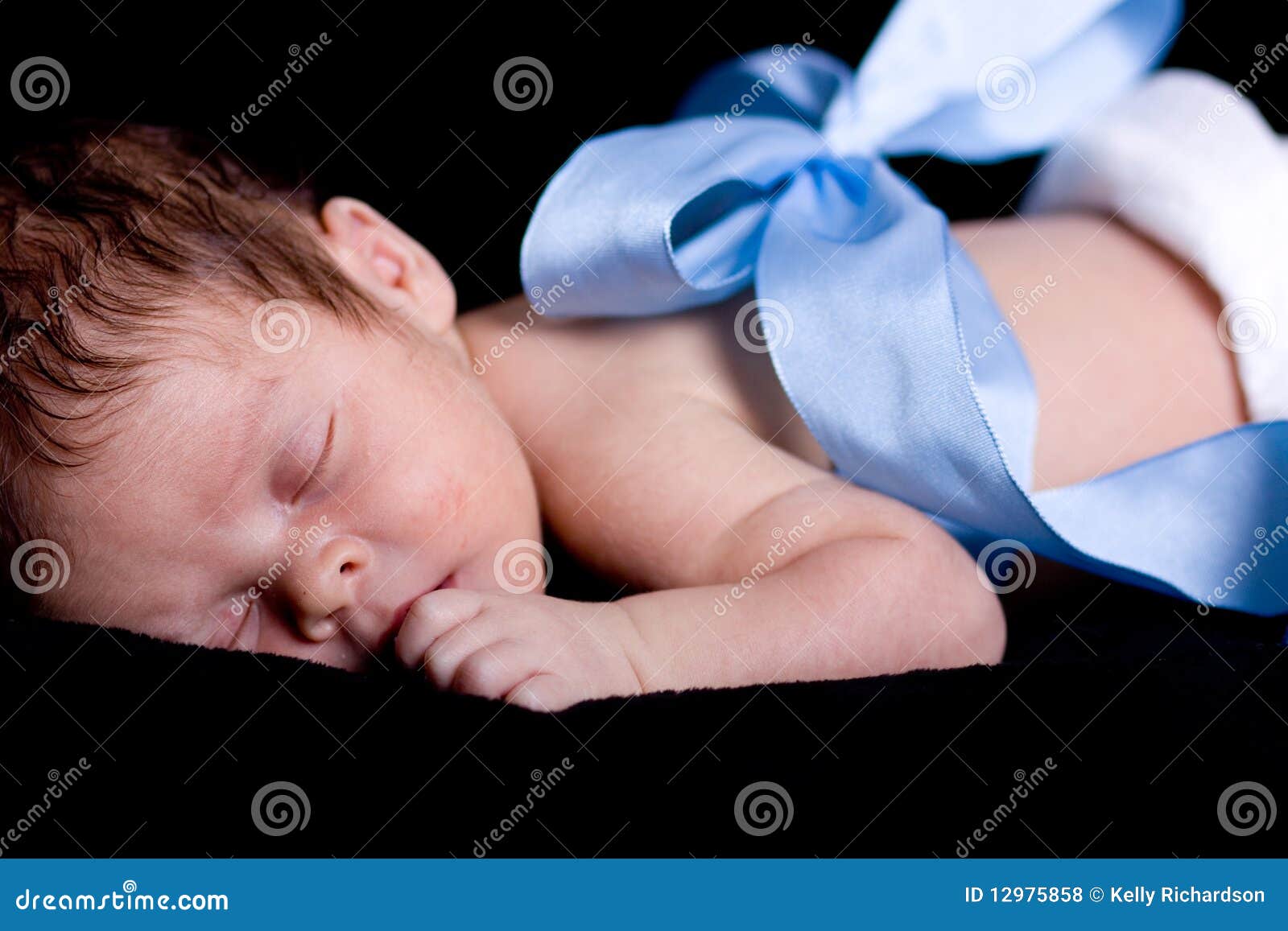 Baby Wrapped in Blue Ribbon Stock Photo - Image of miracle, bare: 12975858