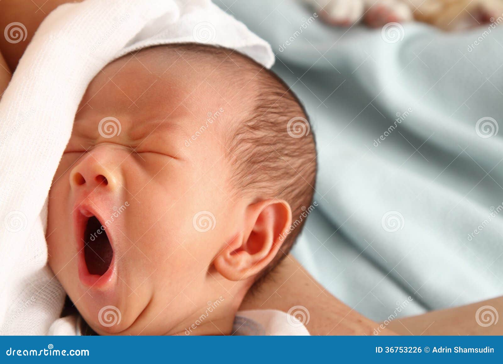 Yawning Newborn Baby