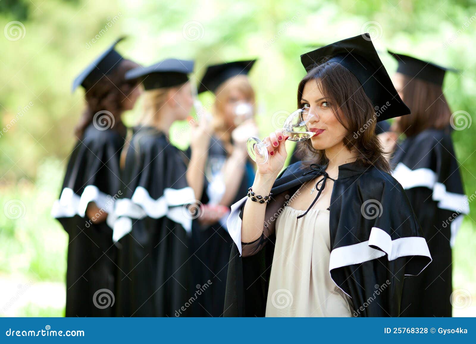 Bachelor Graduates Celebrate Stock Photo - Image of expertise, gown ...