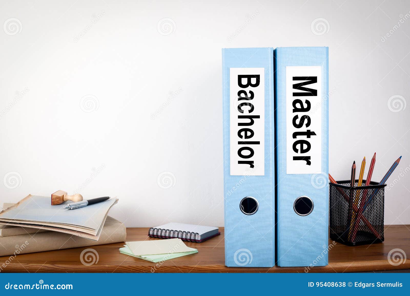 Bachelor and Master Binders in the Office. Stationery on a Wooden Shelf ...