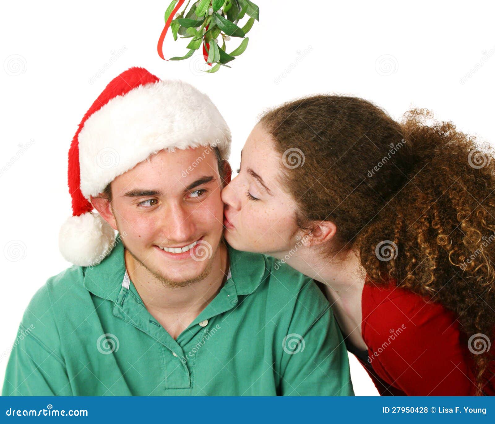 Bacio Di Natale Sotto Il Vischio Fotografia Stock - Immagine di uomini ...