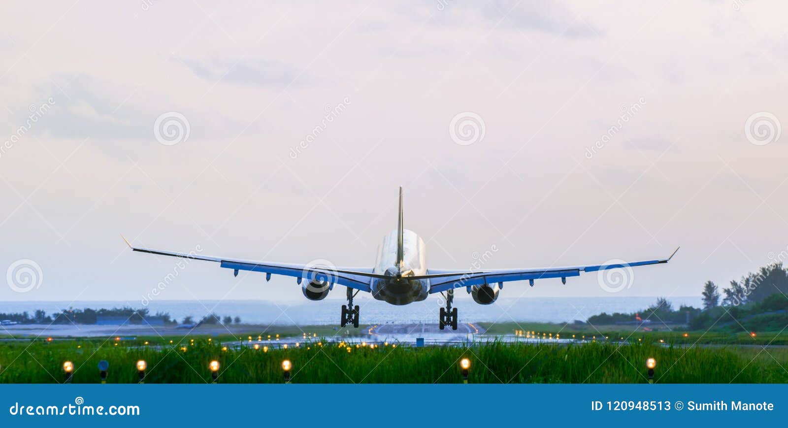 Back of the Arriving Airplane Stock Image - Image of back, sunrise ...