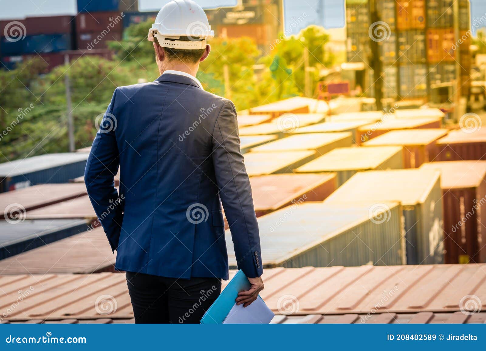 Back of Asian Engineer in Blue Suit Standing on Top of the Container ...