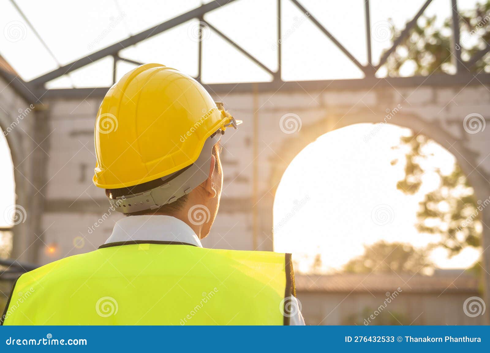 Back of Asian Engineering Man Looking To Construction Analyzing about ...