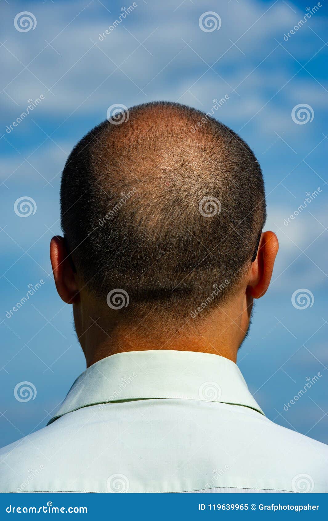 Back of the balding man. stock image. Image of close - 119639965