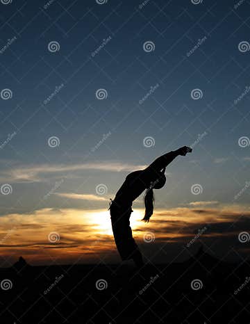 Back bend silhouette stock photo. Image of sunset, long - 2174012