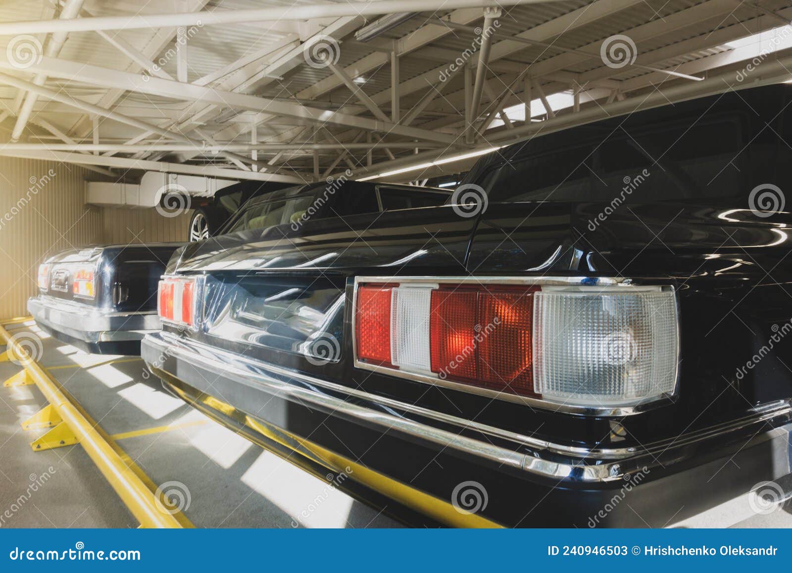 The Back of a Black Limousine. the Limousine is in the Garage Stock ...