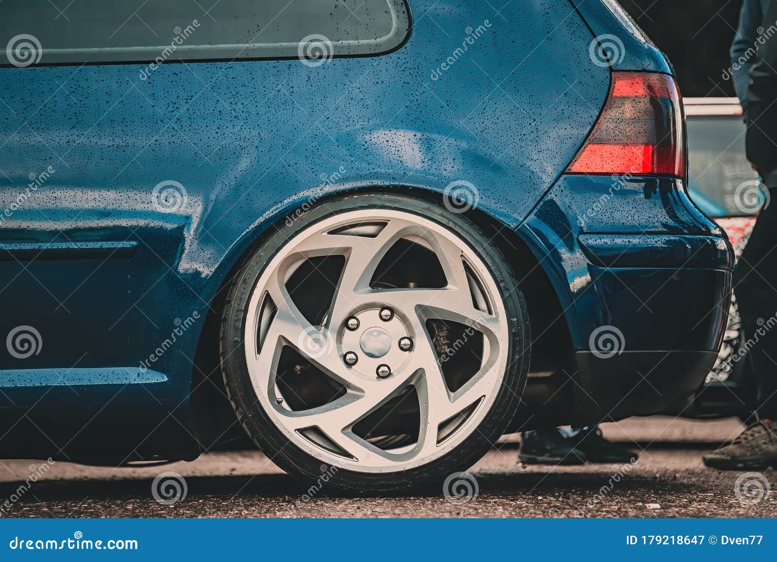The Back of a Blue Low Car. on it Polished Alloy Wheels Stock Image ...