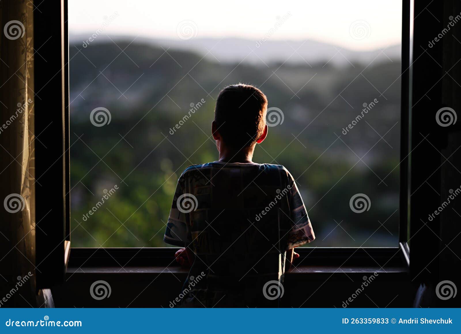 Back of Boy Looking from Window in Sunset Stock Image - Image of ...