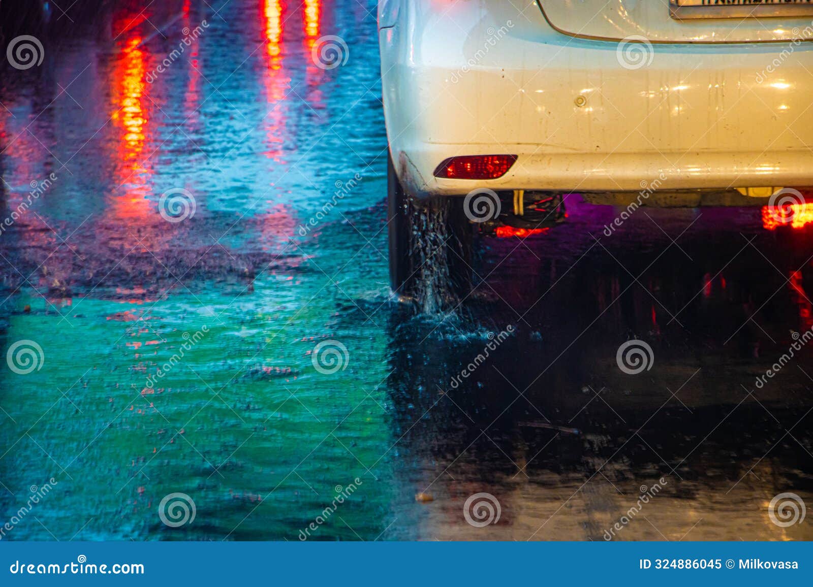 The Back of a Car Driving in the Rain on a Wet Road Stock Image - Image ...