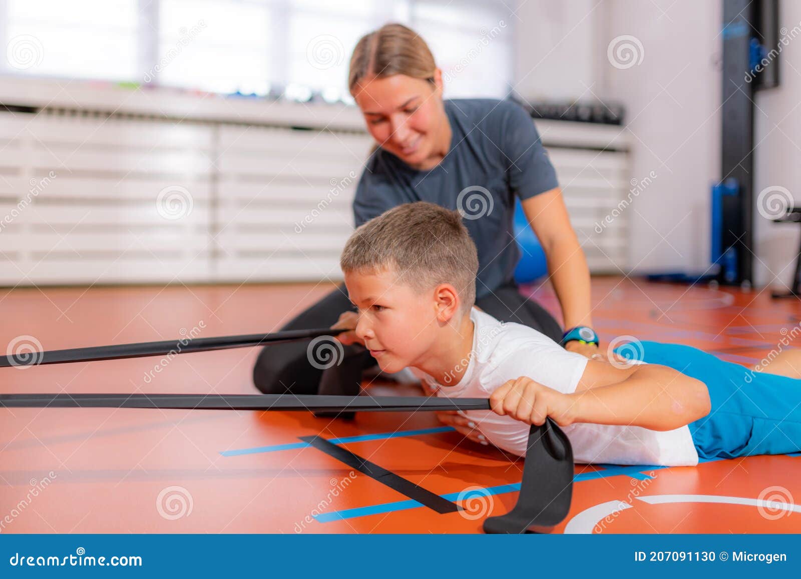 Back Exercise for Children, Using Resistance Bands Stock Photo - Image ...