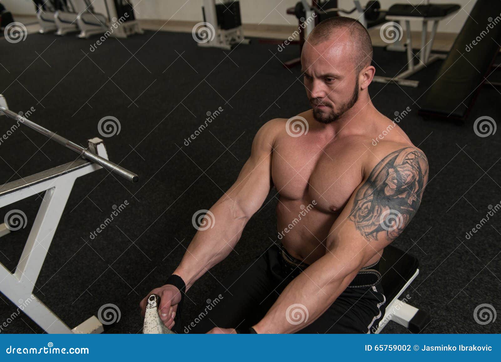 Back Exercises on a Seated Row Machine Stock Photo - Image of ...