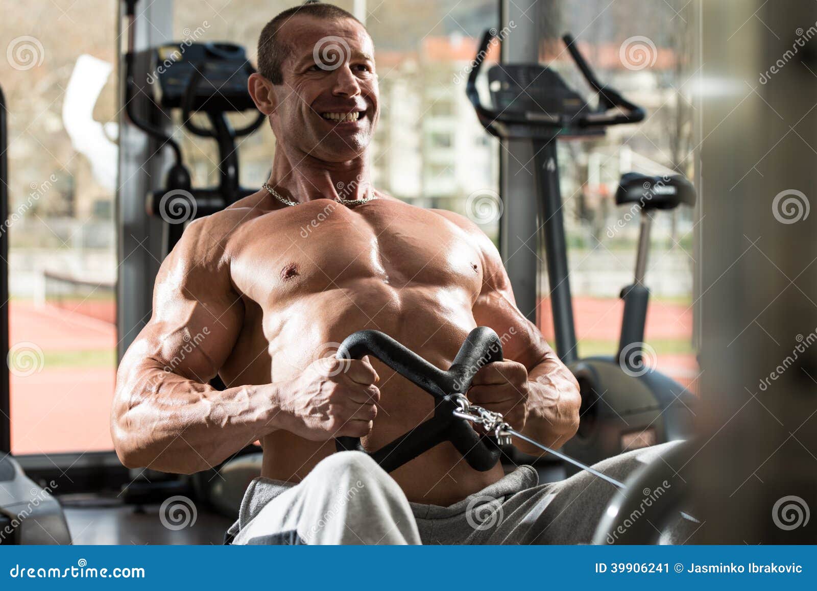 Back Exercises on a Seated Row Machine Stock Image - Image of athlete ...