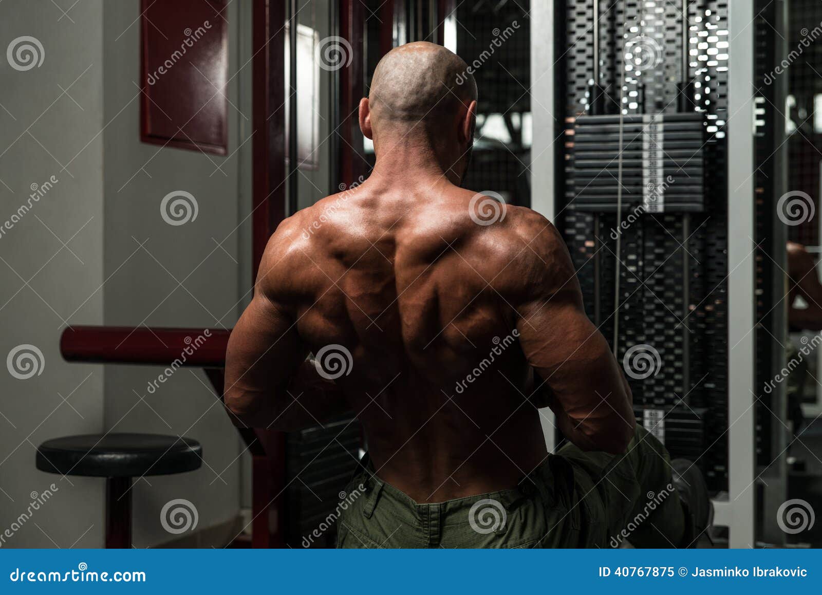 Back Exercises on a Seated Row Machine Stock Image - Image of building ...
