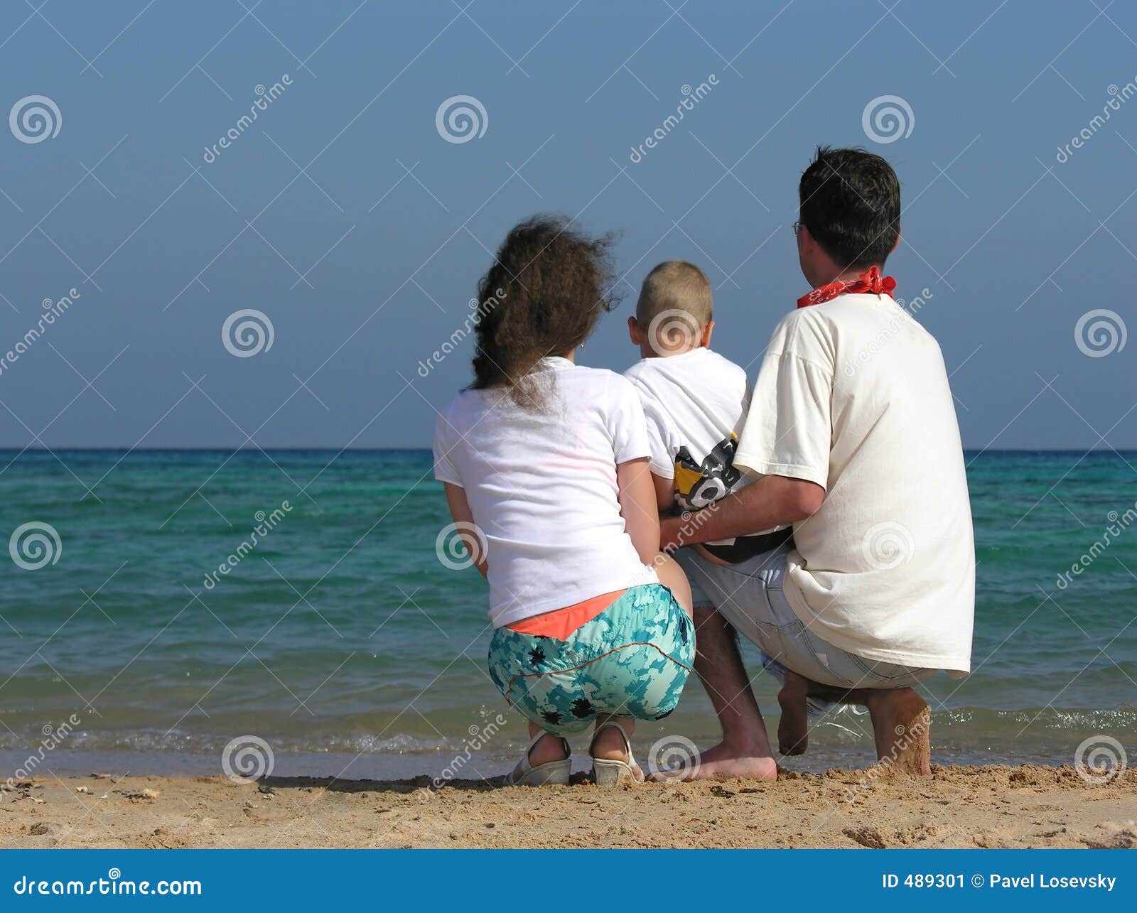 Back Family of Three Sit on Beach Stock Image - Image of blue, face: 489301