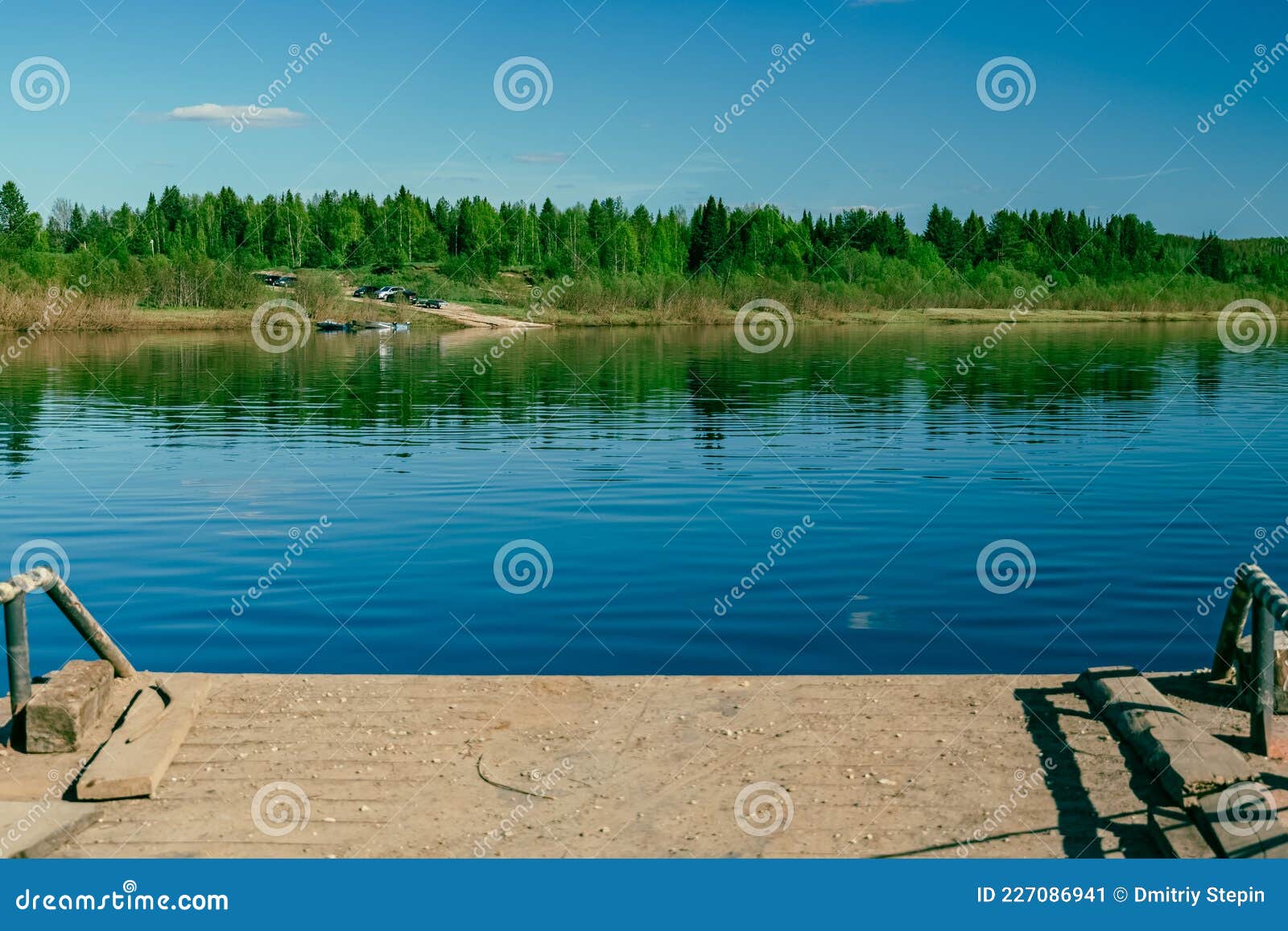 The Back of the Ferry with a View of a Summer Landscape with a River ...