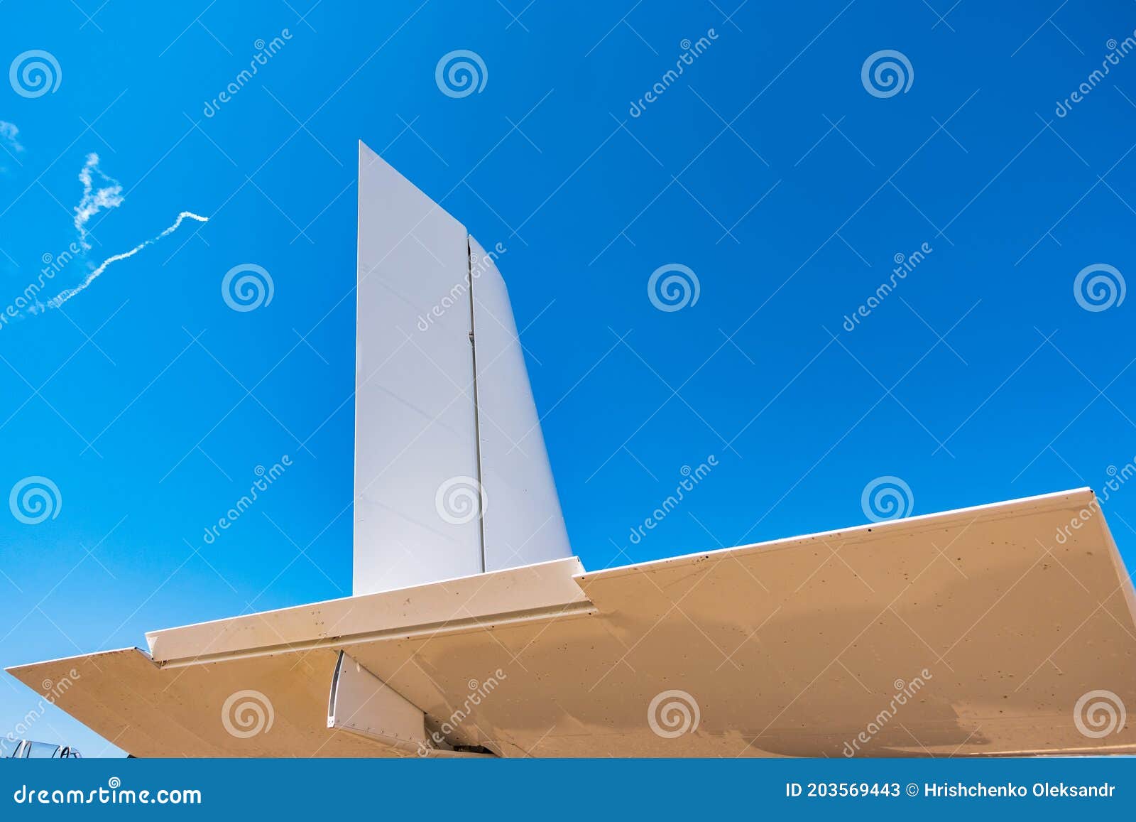 The Back Of The Fuselage Of A Light-engine Aircraft Against The Sky ...