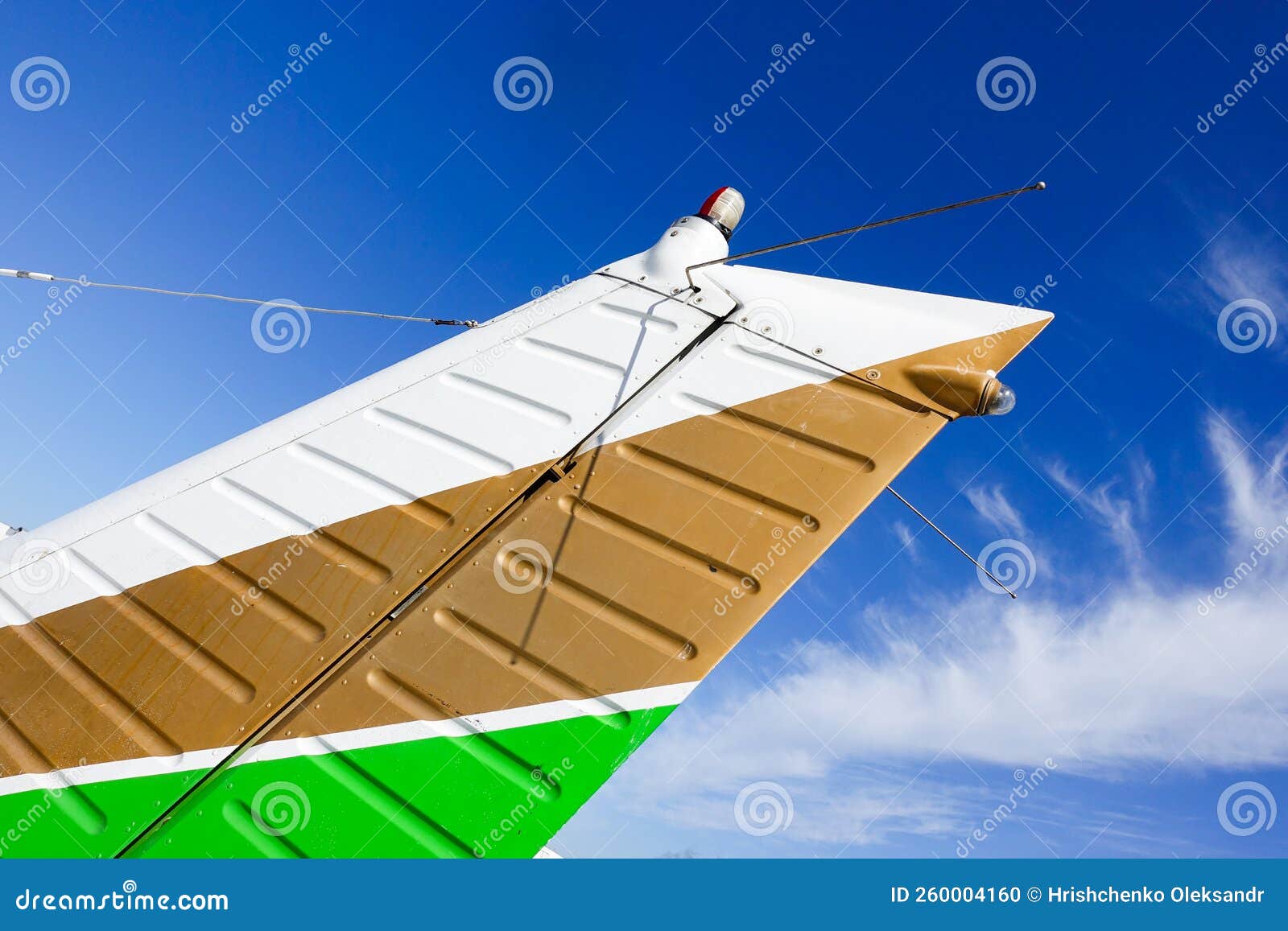 The Back of the Fuselage of a Light-engine Aircraft Against the Sky ...