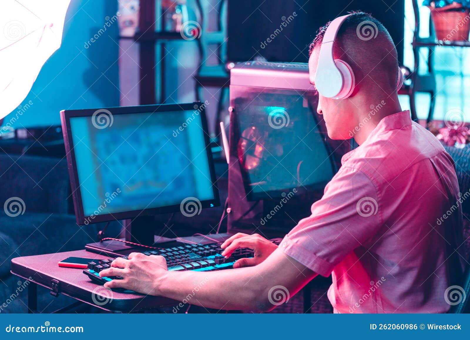 Back of Gamer Playing a Video Game on a Computer Stock Photo - Image of ...