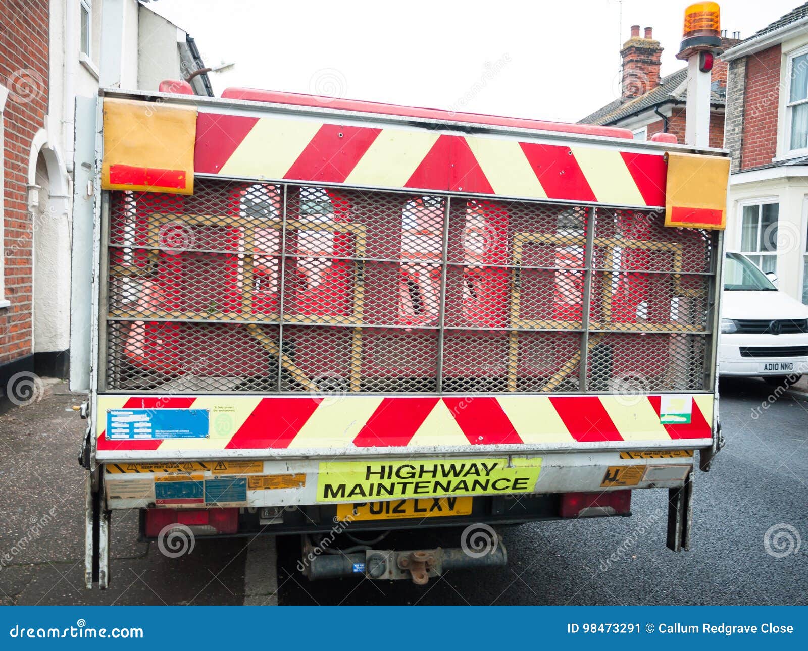 Highway Maintenance Council Workers With Wheelbarrow Repairing Pavement ...