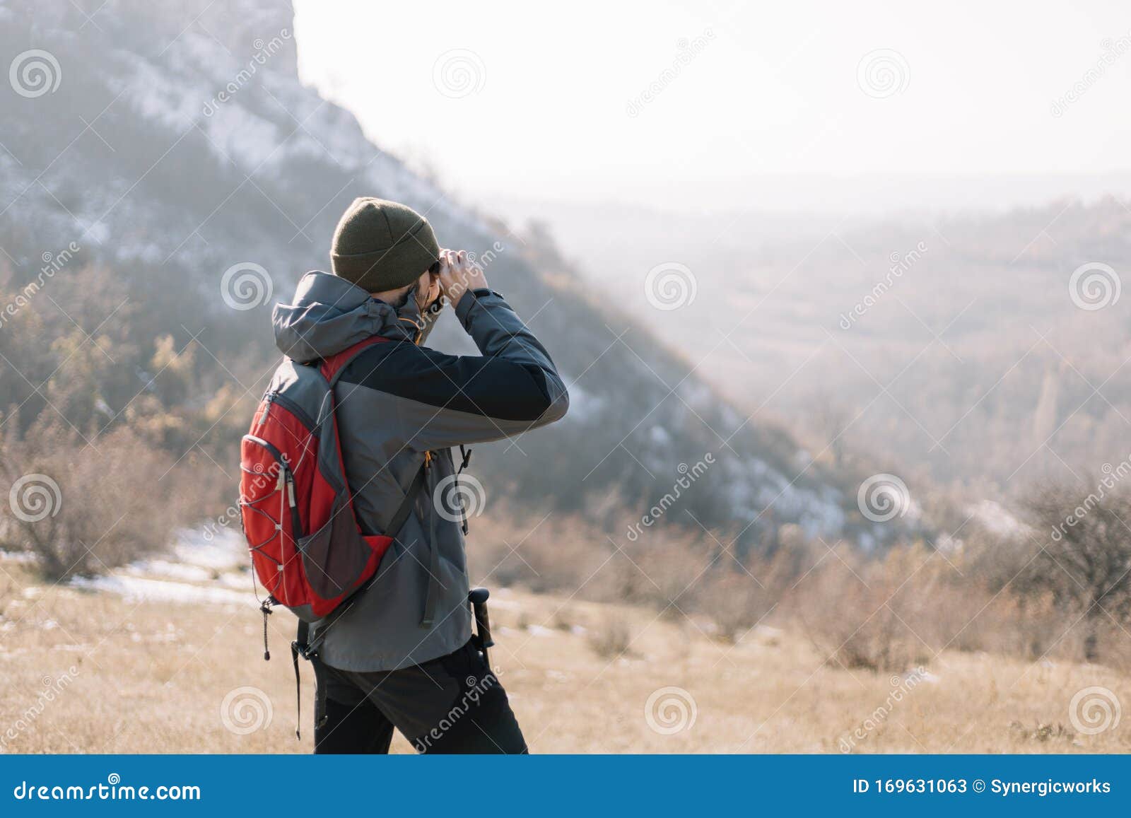 Back of a Hiker Man Looking with Binoculars Stock Image - Image of ...
