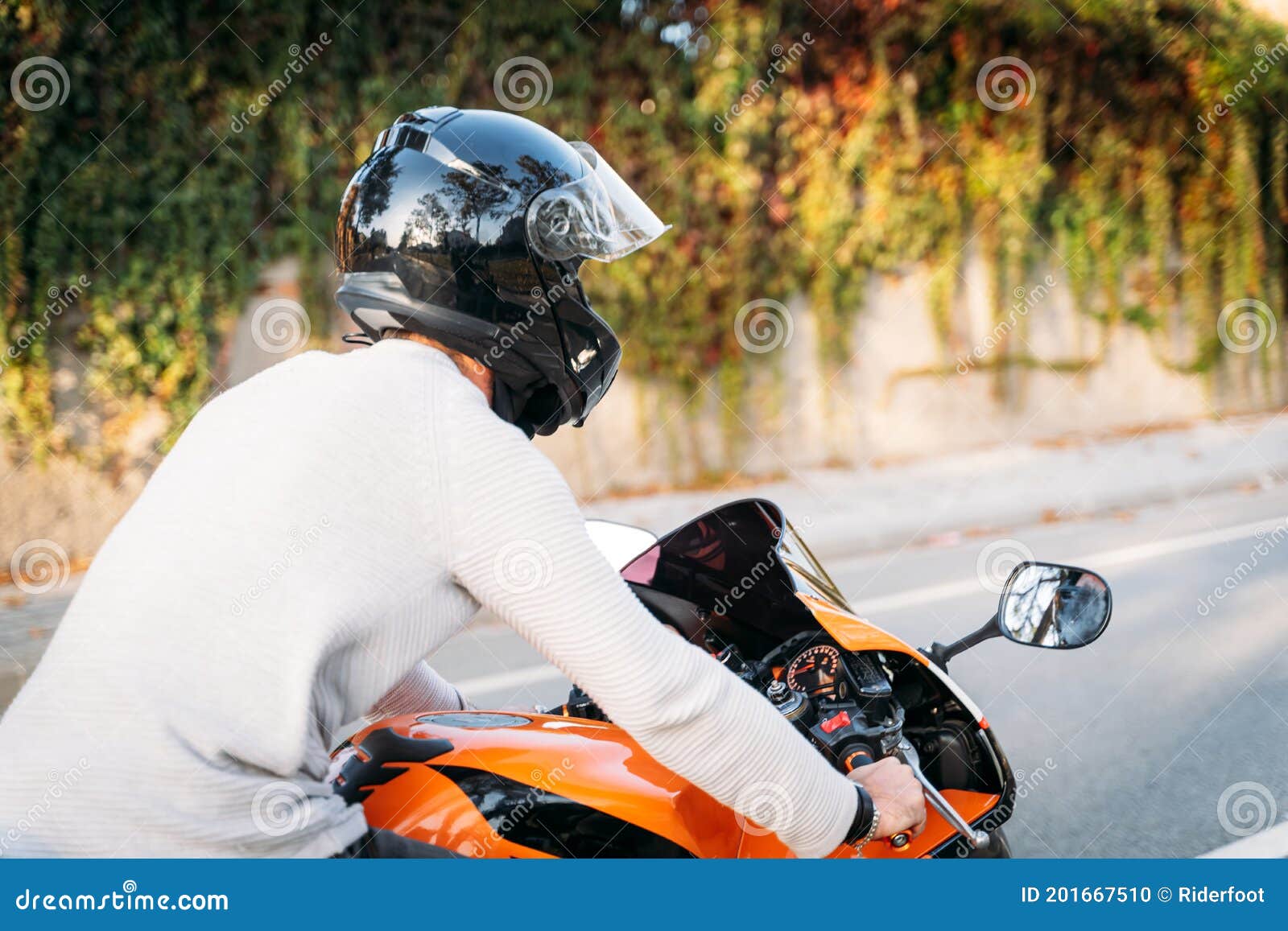 Back of a Man in a Helmet Driving a Motorcycle Stock Photo - Image of ...