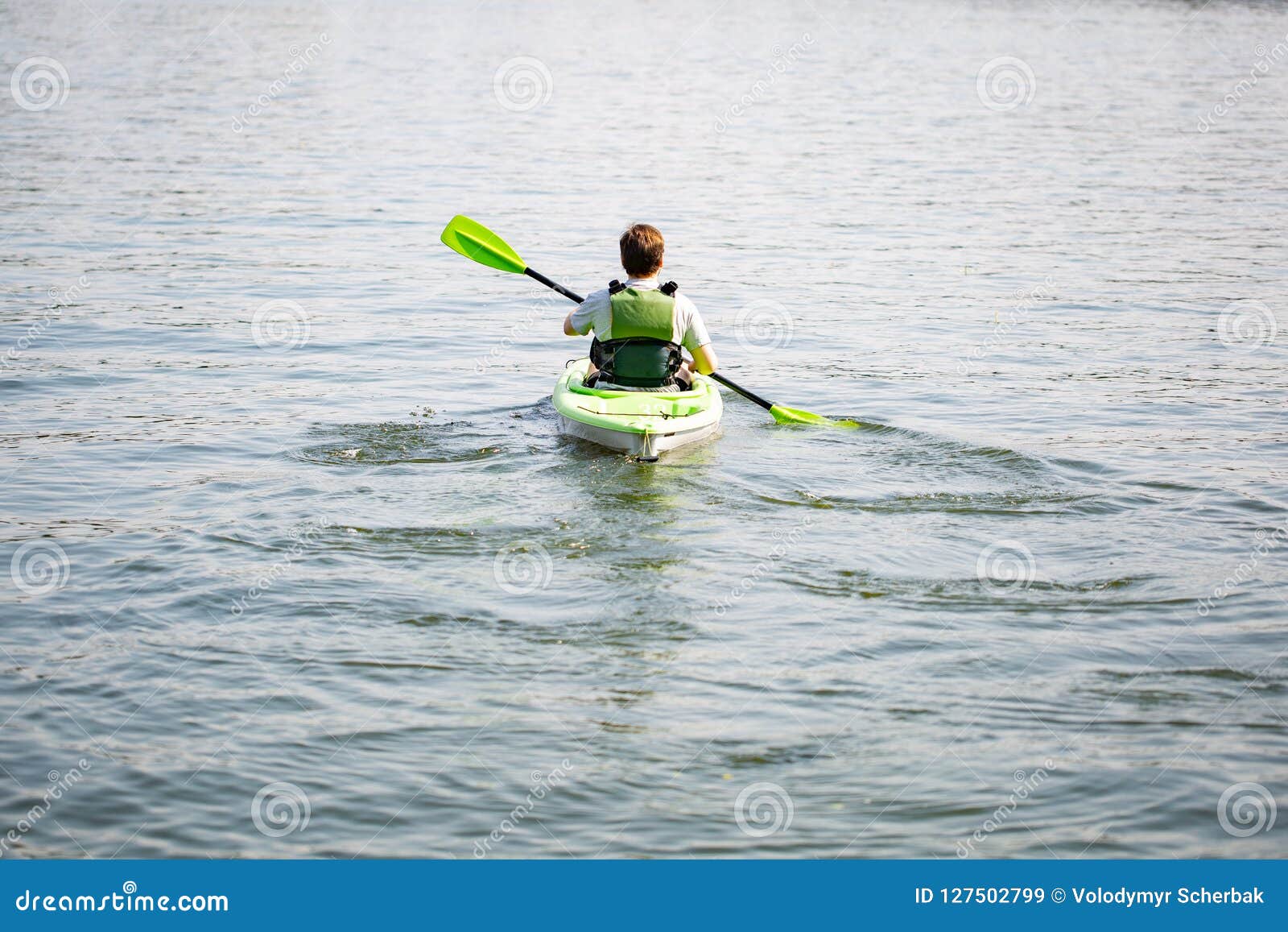 Back of a Man Rowing in the Canoe Editorial Stock Image - Image of ...