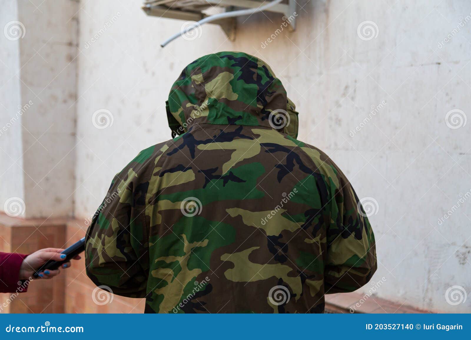The Back of a Military Man Giving an Anonymous Interview Stock Photo ...