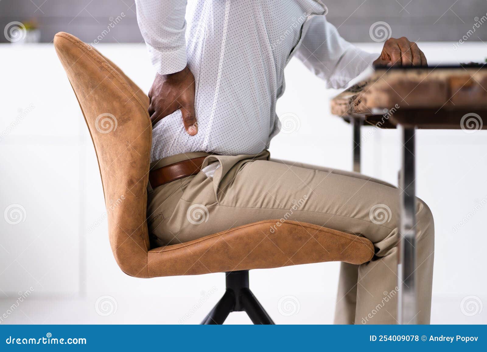 Back Pain Bad Posture Man Sitting Stock Photo - Image of young ...