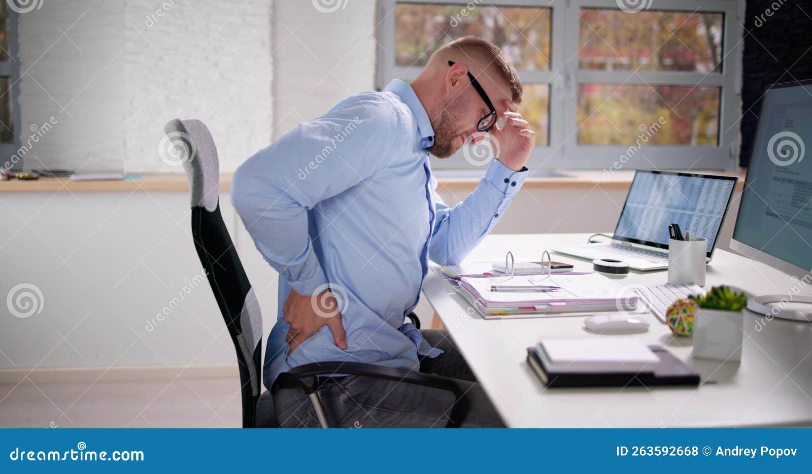 Back Pain Bad Posture Man Sitting Stock Photo - Image of dealing, back ...