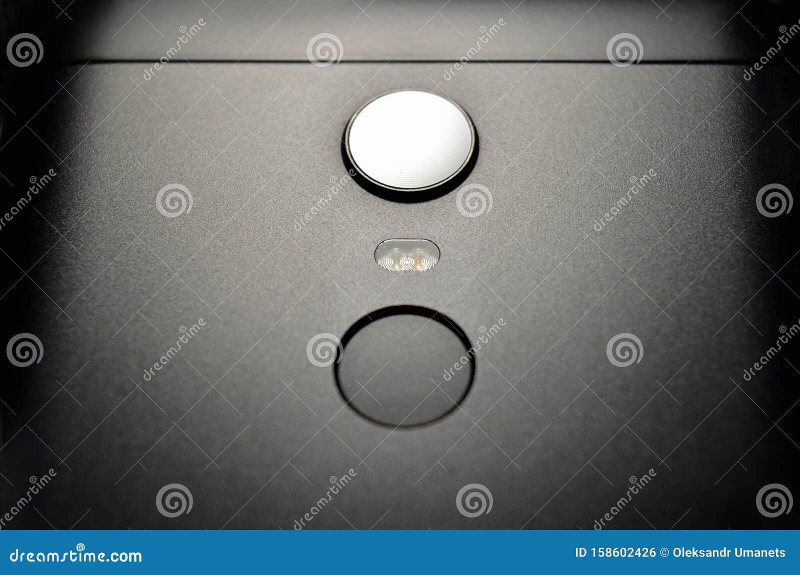 Back Panel and Smartphone Camera in the Dark, Close Up Stock Photo ...