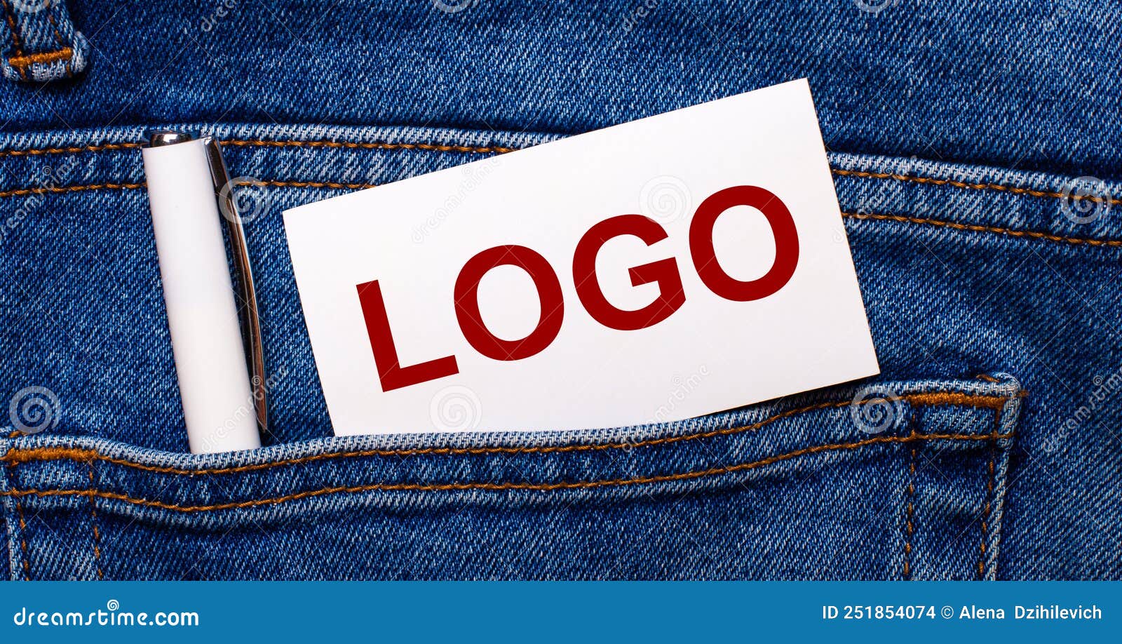 The Back Pocket of Blue Jeans Contains a White Pen and a White Card ...